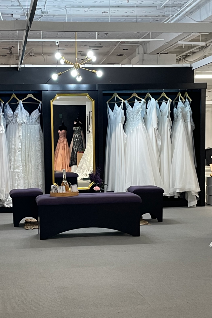 White Wall Anchored Dress Racks - Bridal Displays